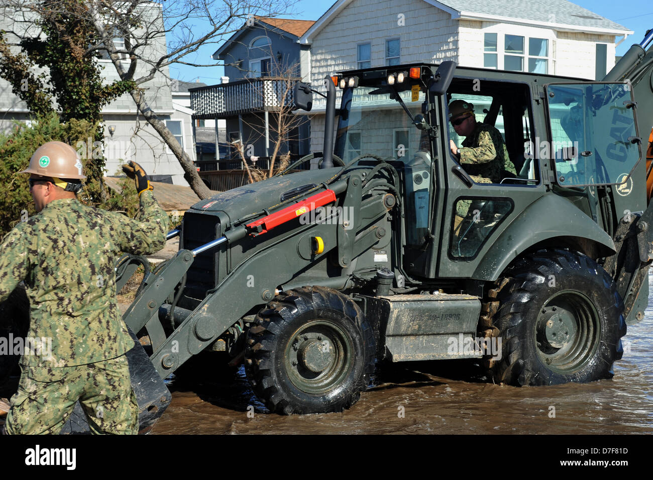 QUEENS, NY - NOVEMBER 09: U.S. Marines move a debris and parts of ...