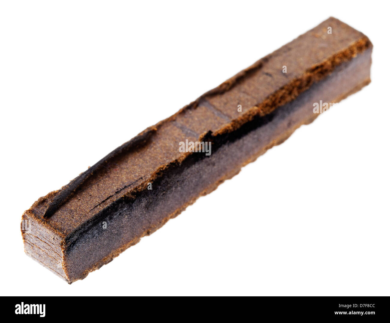 A 10 grams piece of Hashish isolated on white background. This piece ...