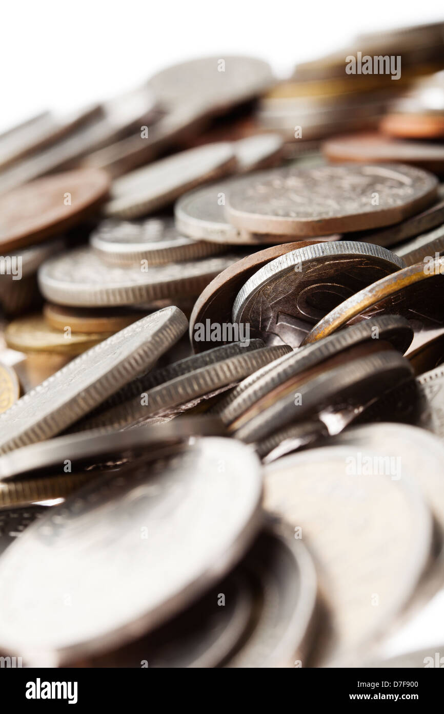Macro shot of a large quantity of unrecognizable coins stacked in chaos ...