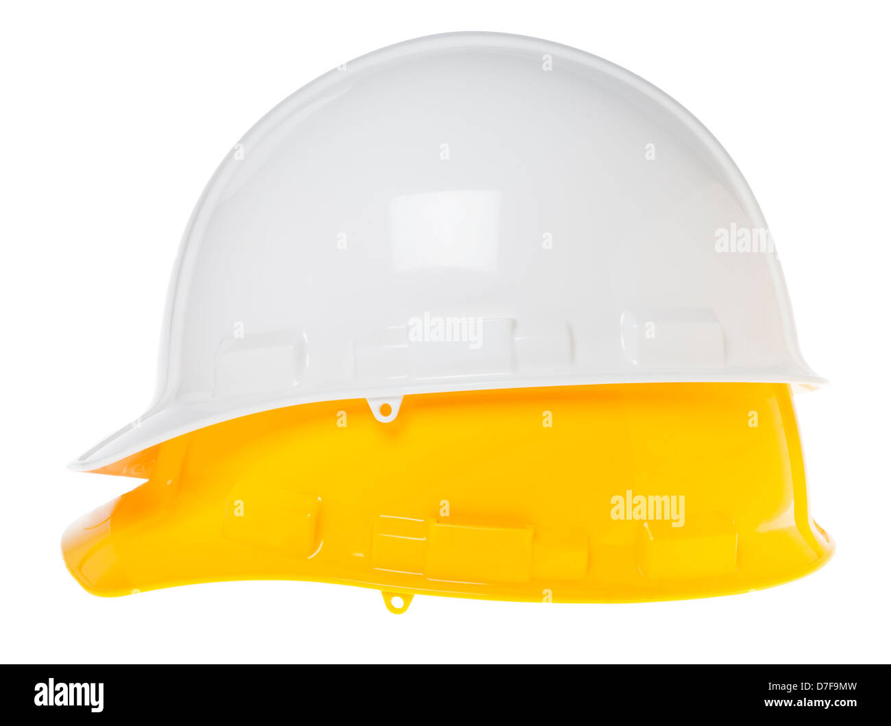 Side view of two hard hats, white on top of yellow, isolated on white ...
