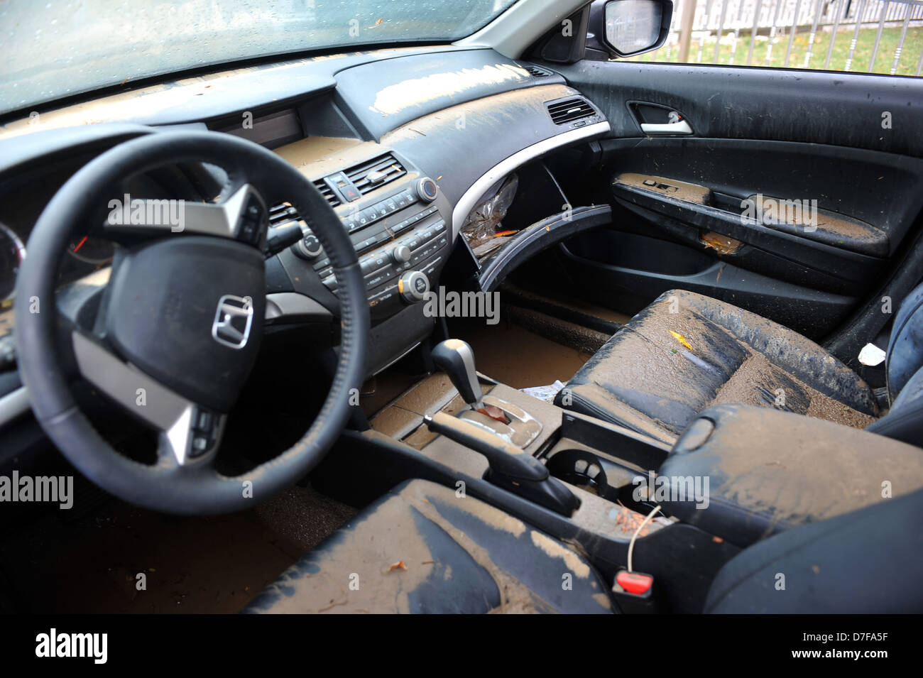 BROOKLYN, NY - OCTOBER 29: Debris litters and mud inside abandoned car ...