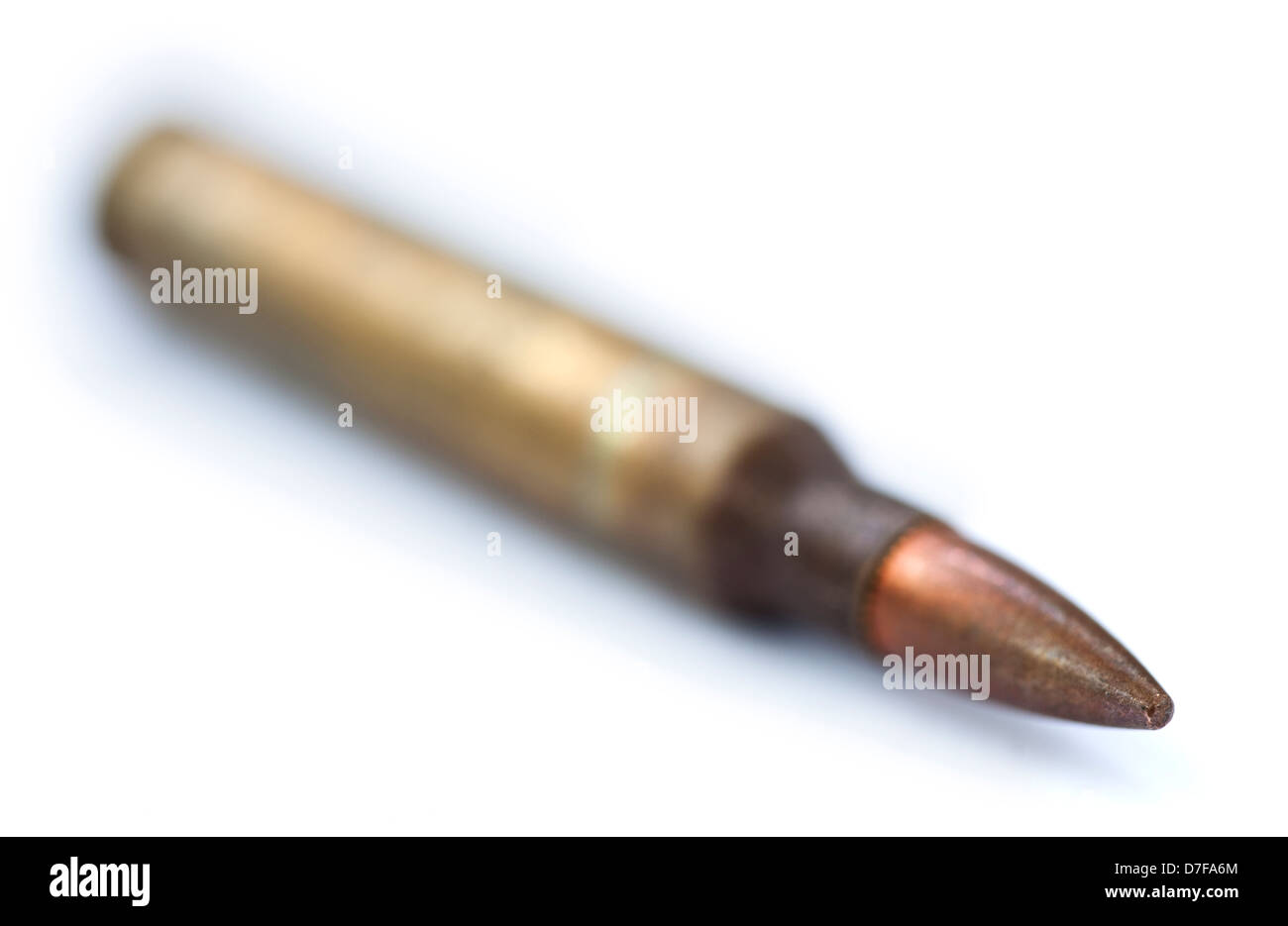 An isolated 5.56 assault rifle cartridges (for M-16 assault rifle for ...