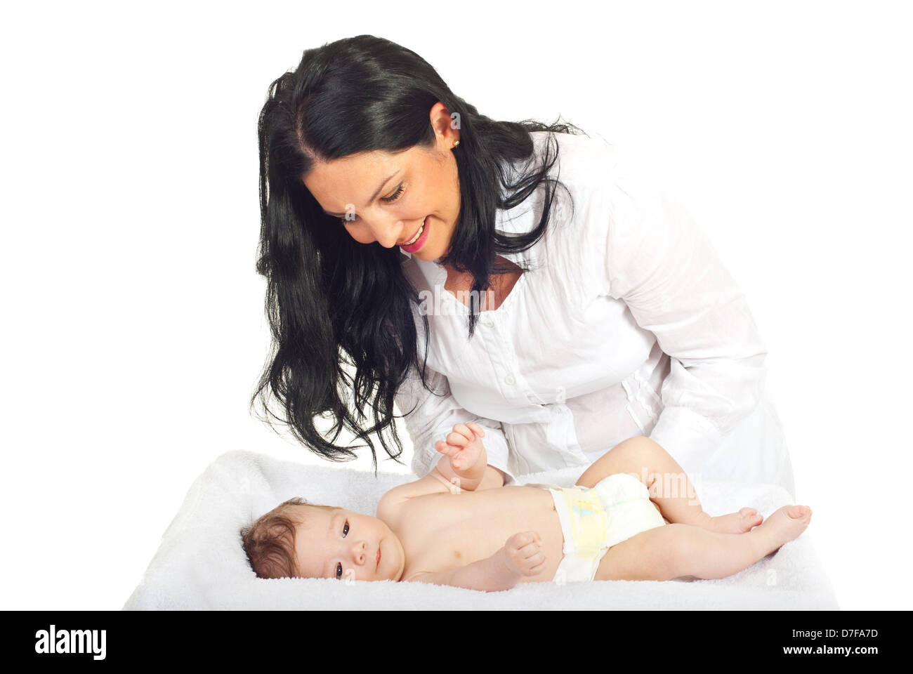 Happy mother caring her newborn baby boy isolated on white background ...