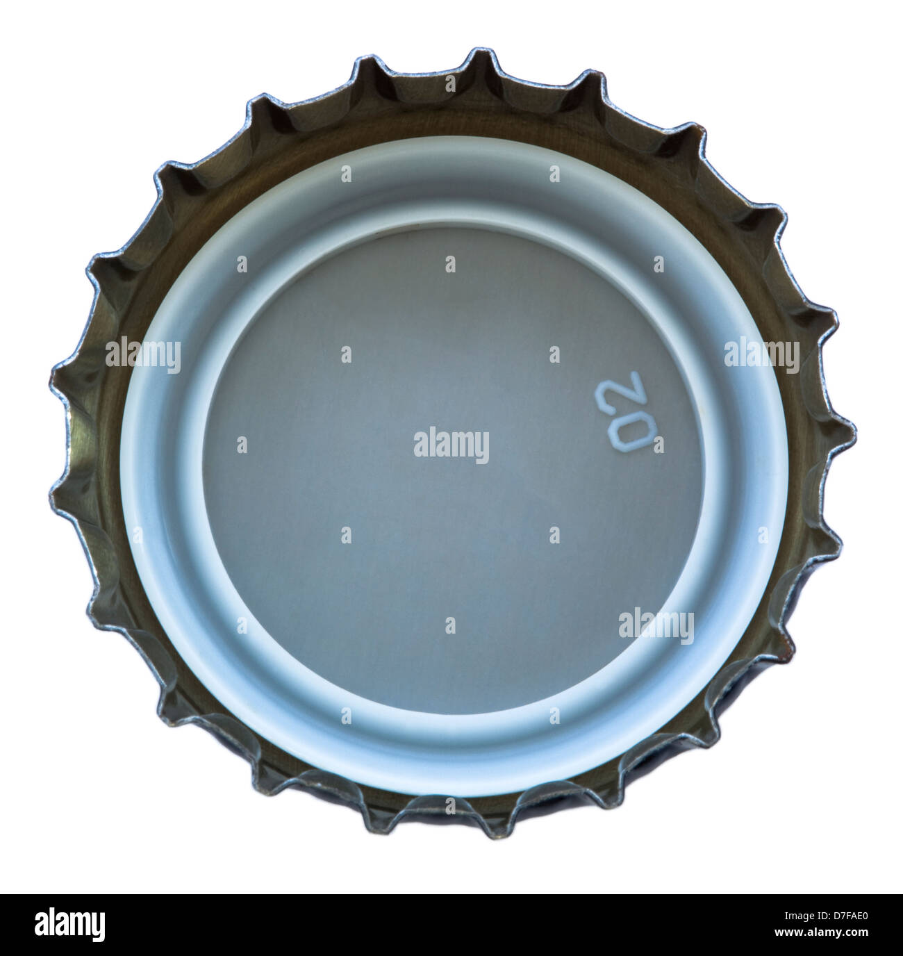 The bottom (inside) part of a metal cap used for glass soda bottles ...