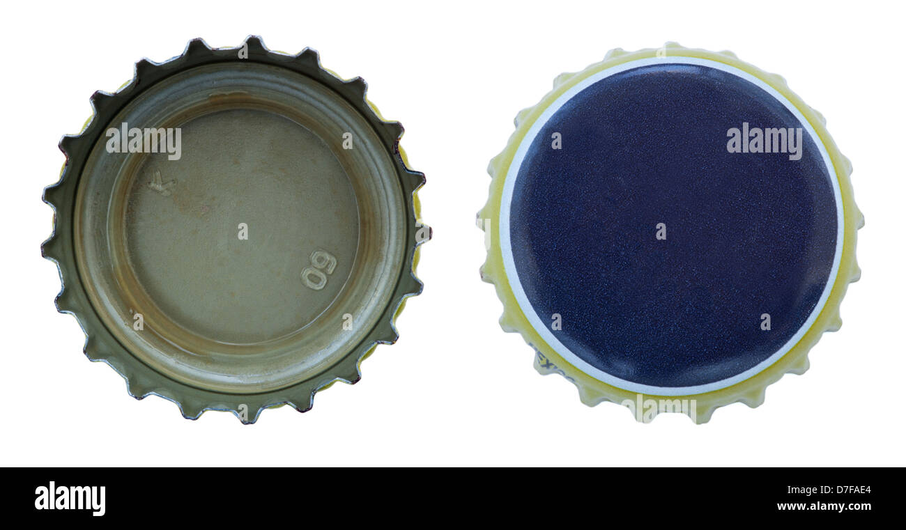 Two sides of blue & yellow colored metal caps, used for beer bottles ...