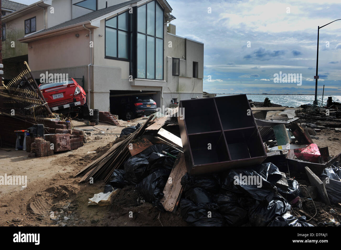 BROOKLYN, NY - NOVEMBER 01: Serious damage in the buildings and cars at ...