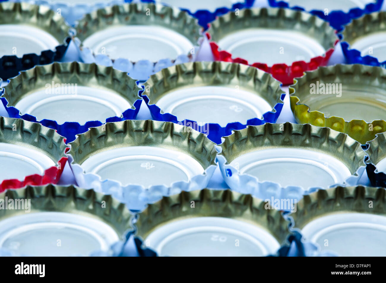 Five rows of metal bottle caps alighned upside down Stock Photo - Alamy