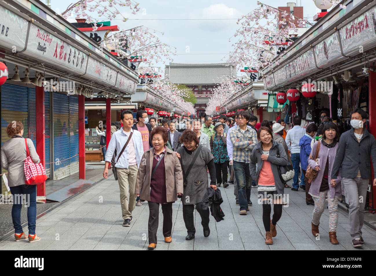 People flocking on Nakamise dori a street with shops and stores ...