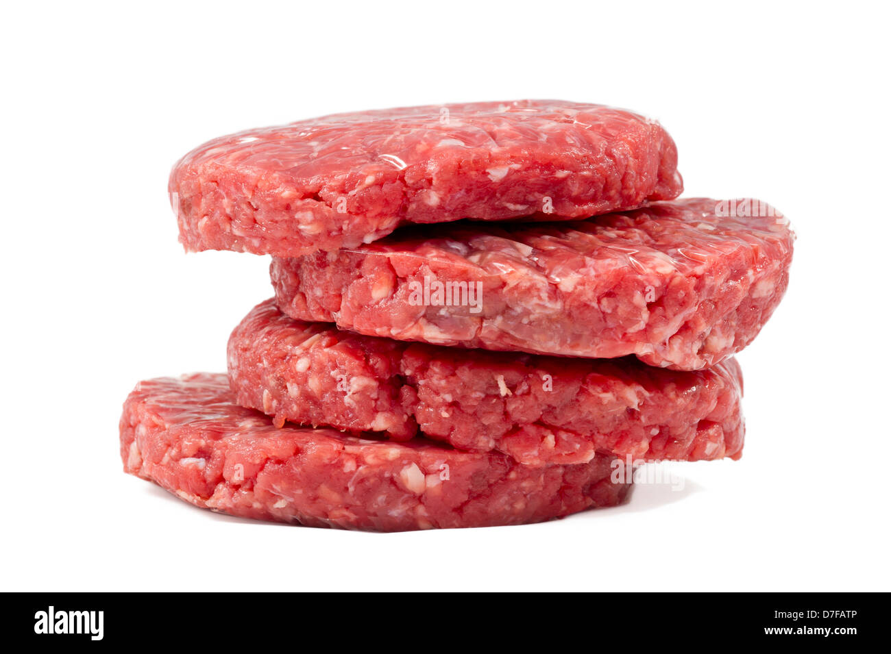 raw hamburgers with protective film in white background Stock Photo - Alamy