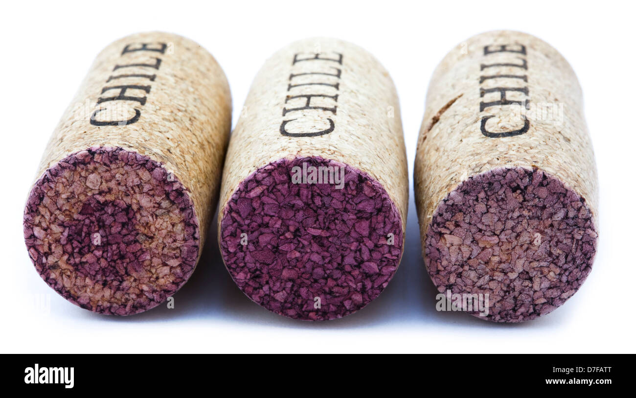 Three corks aligned in a row isolated on white background. Very shallow ...