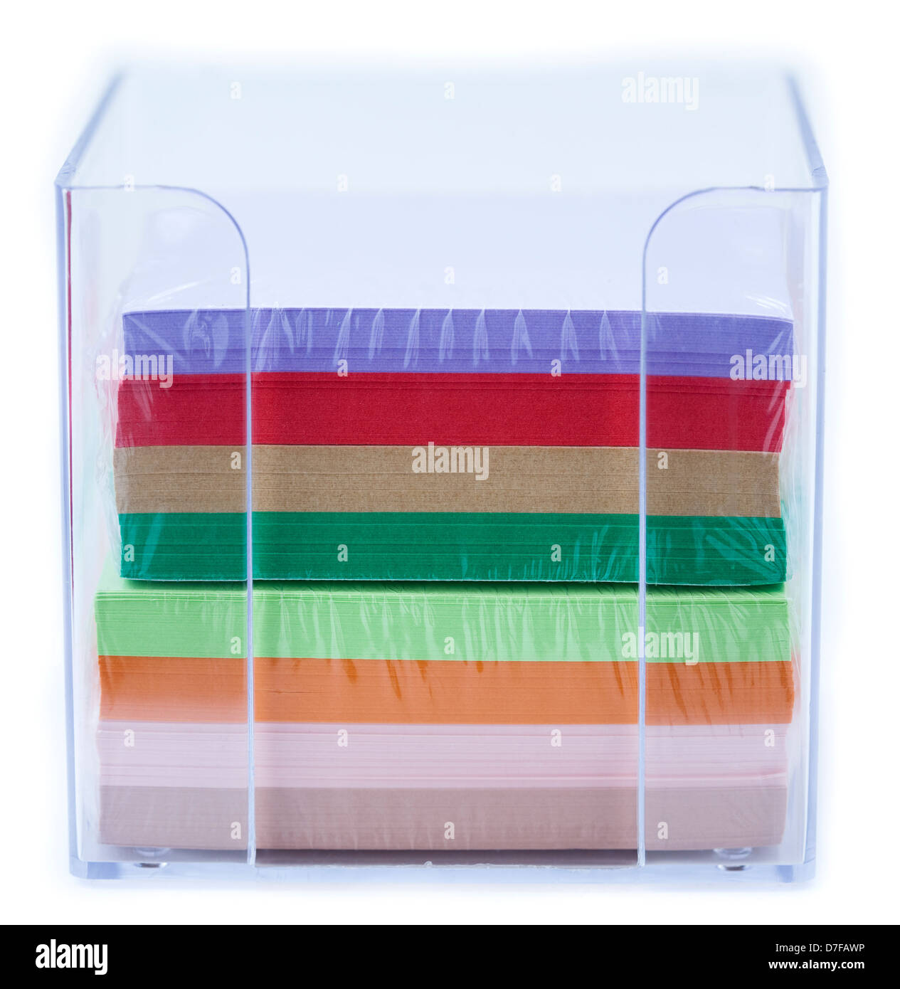 A colorful stack of notes still in their nylon wrap inside a ...