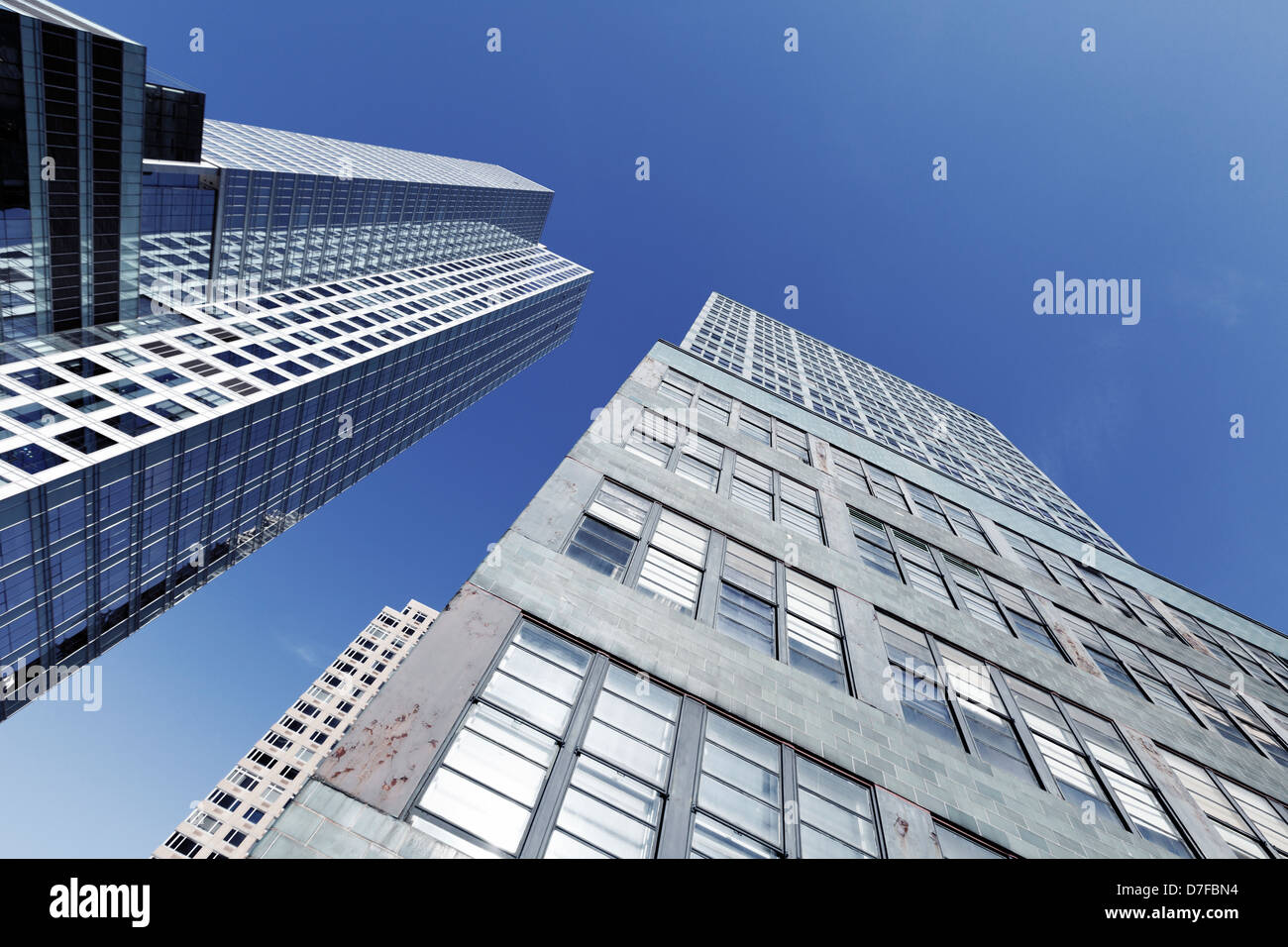 Low & wide angle tilted view of office buildings scraping the Manhattan ...