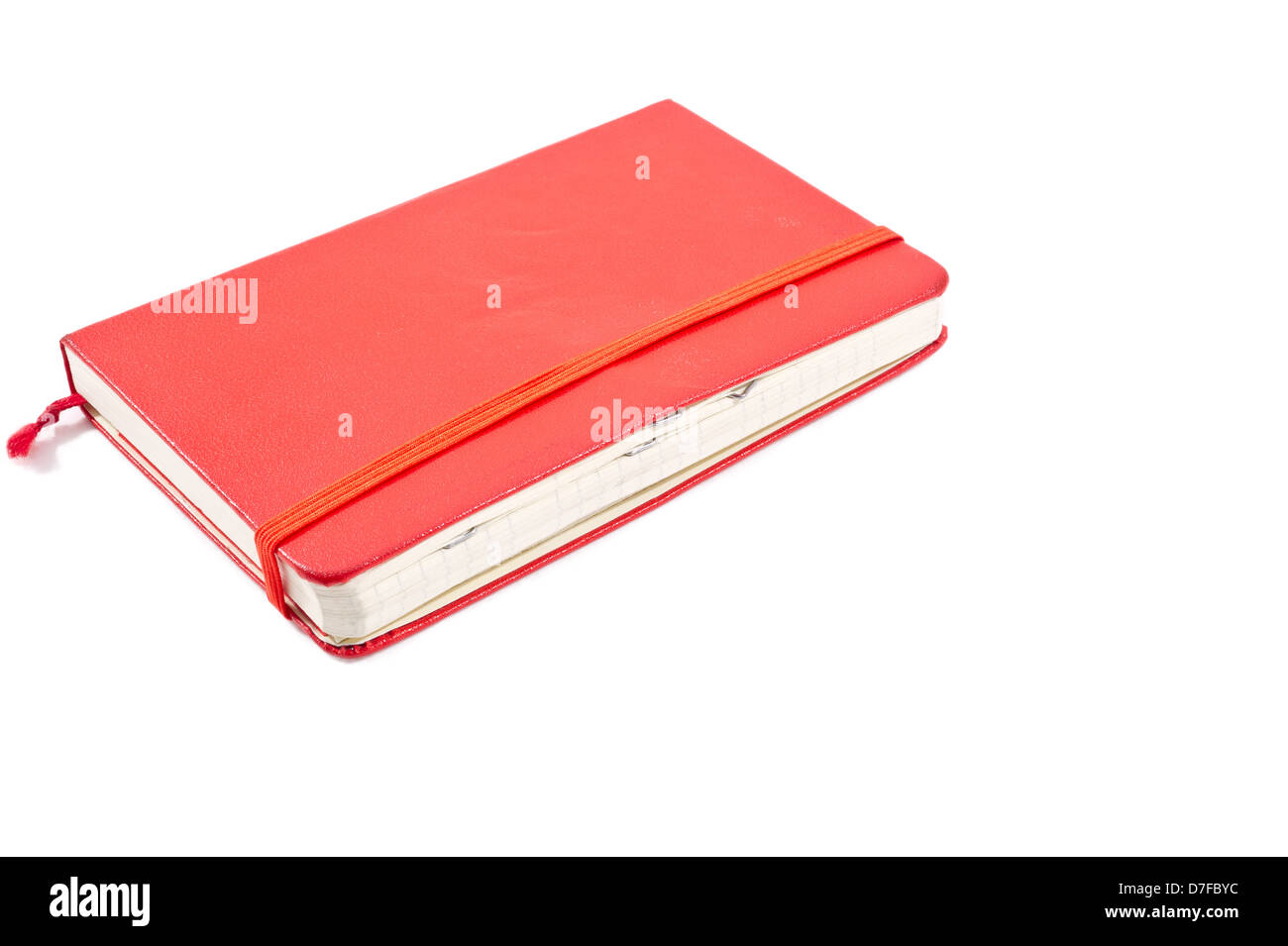 Red journal with staples on pages over white background Stock Photo - Alamy