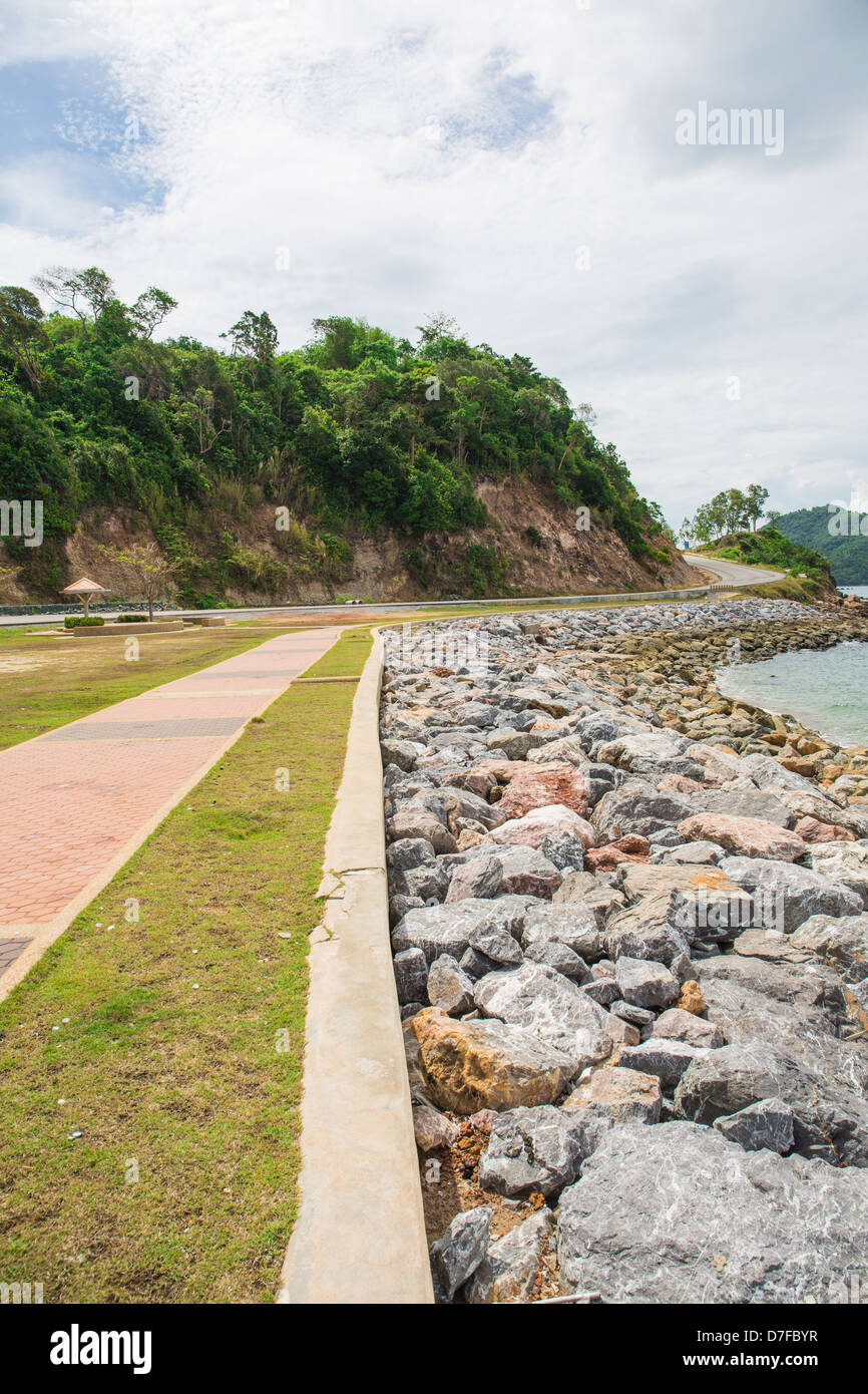 Protect coastal waves , Path around the shoreline Stock Photo - Alamy