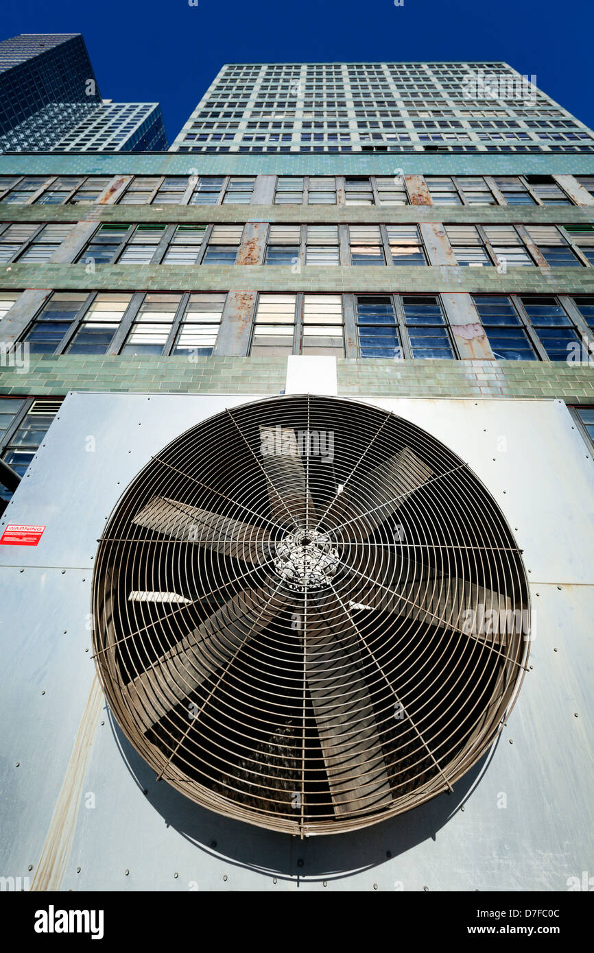 Wide angle view an outdoor HVAC air conditioner unit located on high ...