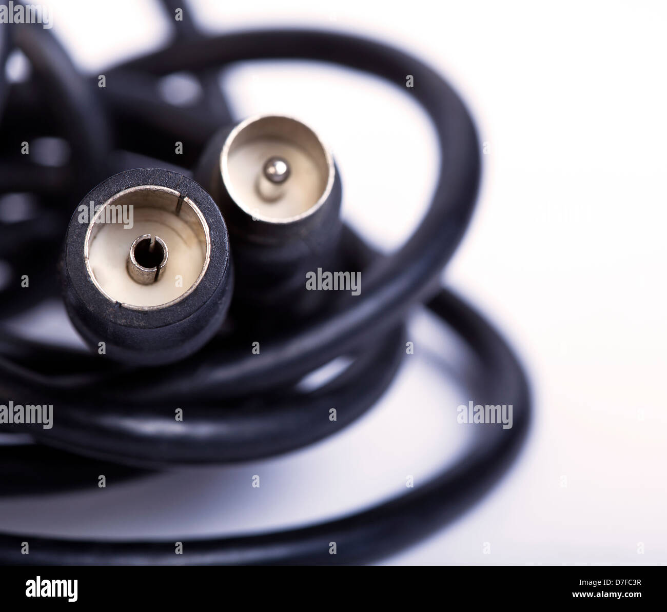 Used black RF cable with very shallow depth of field Stock Photo - Alamy