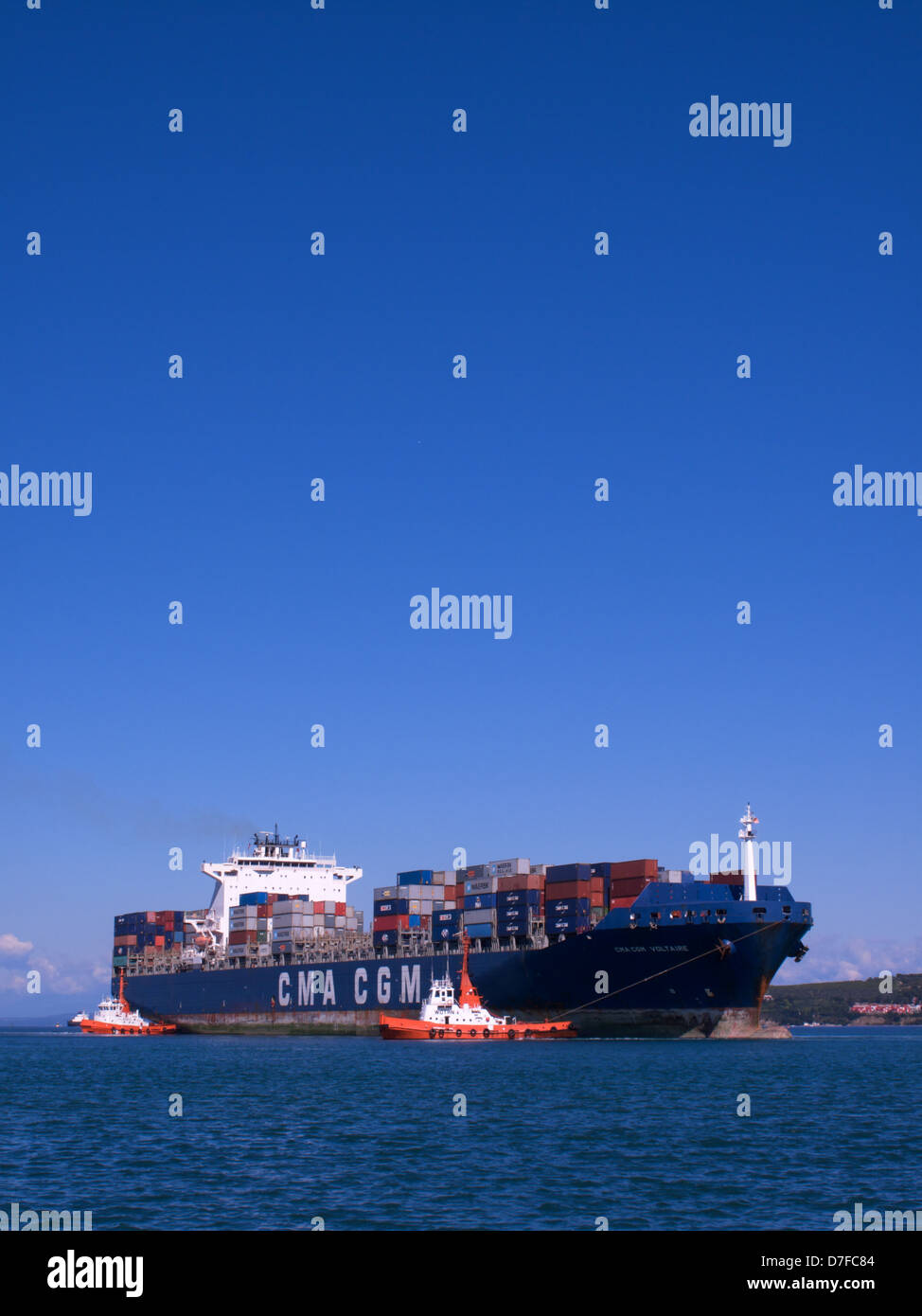 A massive container ship entering the port of Koper in Slovenia Stock ...
