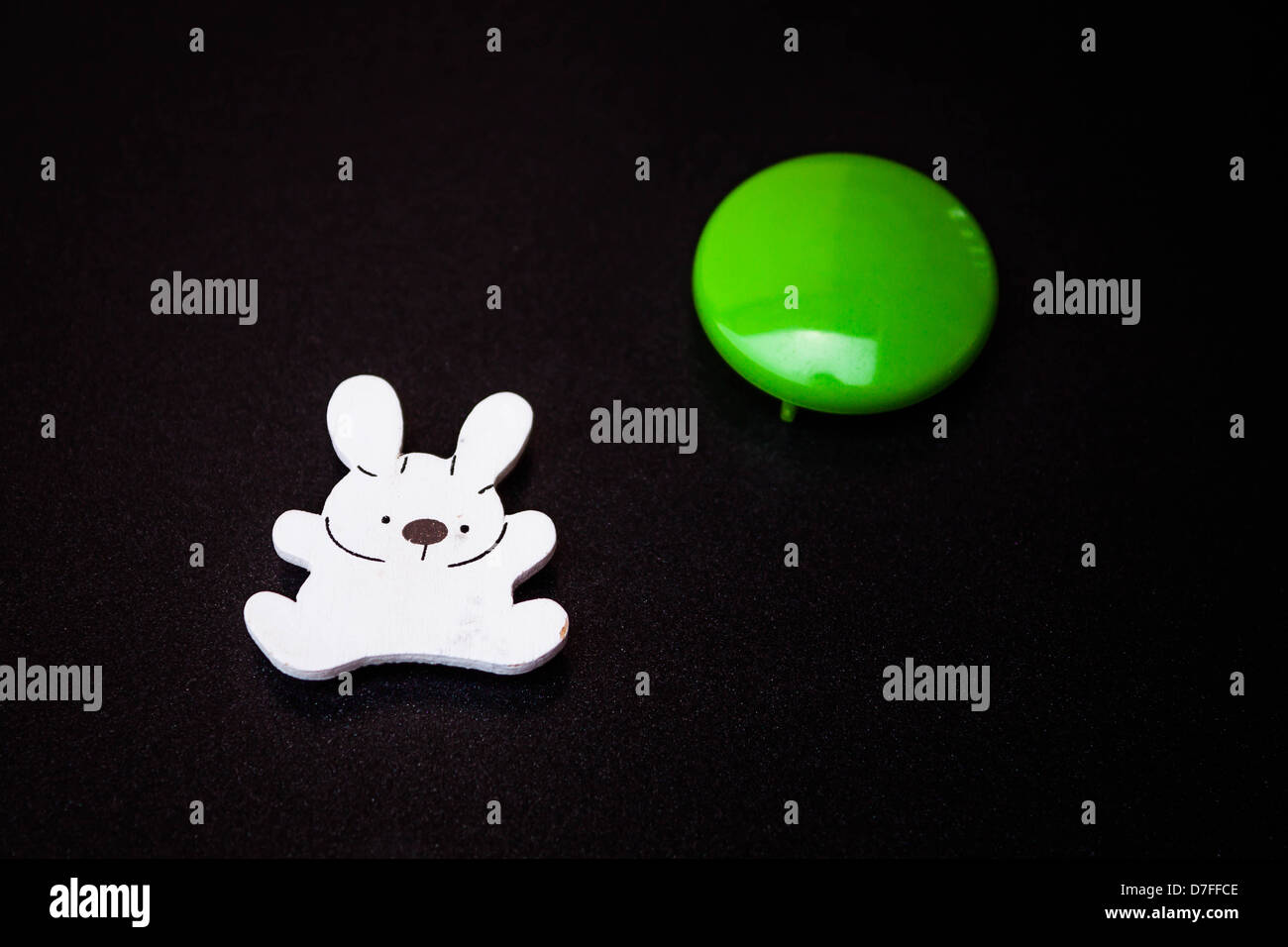 Close up reminder magnets on dark background Stock Photo - Alamy