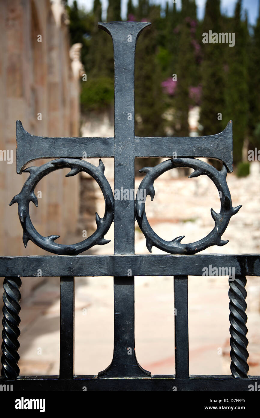 A metal crucifix as part gate decoration on background Church All ...
