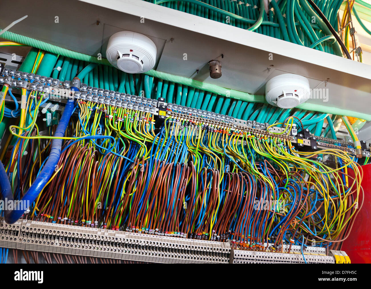 Tilted view very large number electric wires in various colors ...