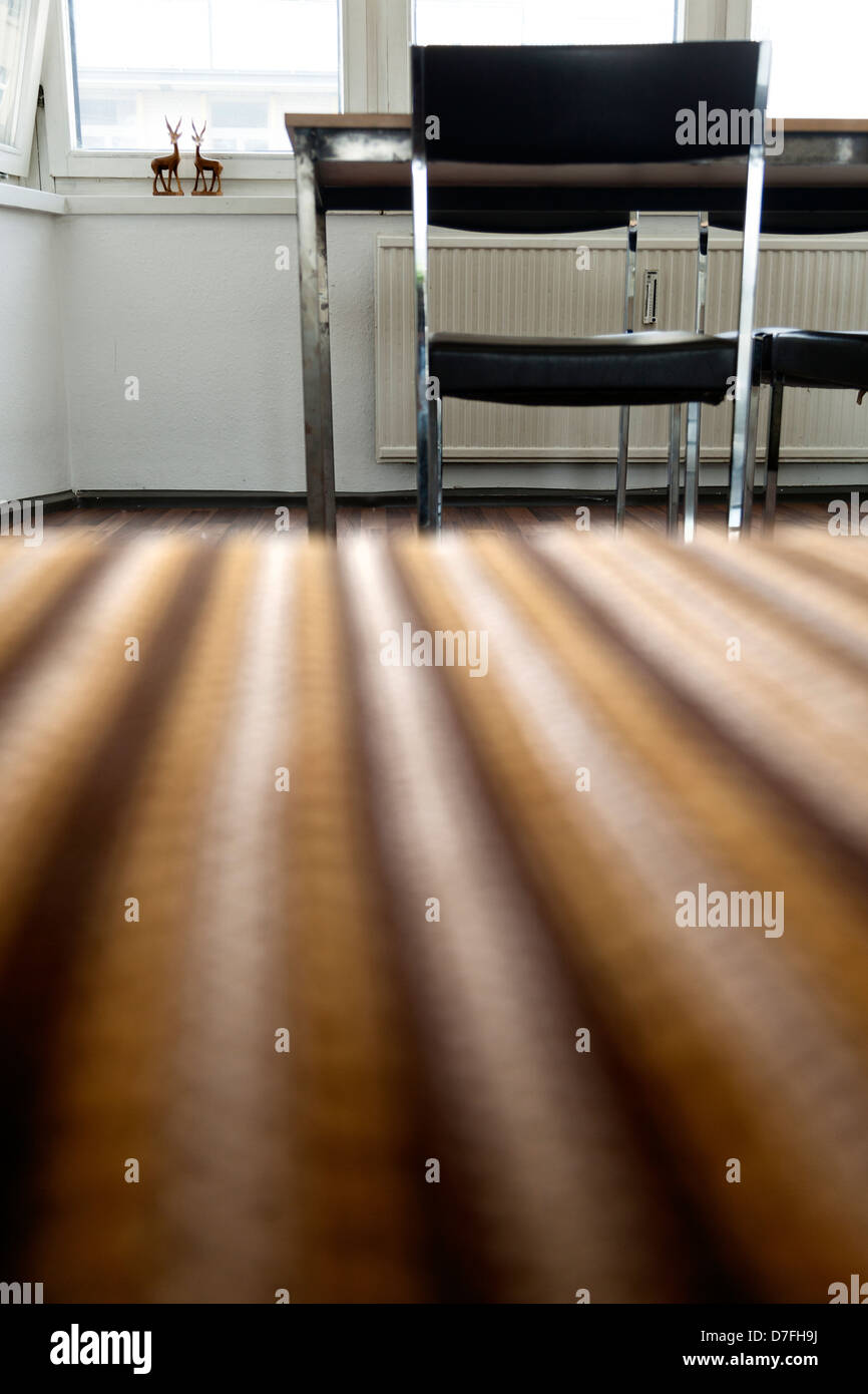 Unique point of view, from the ottoman level, of a living room table ...
