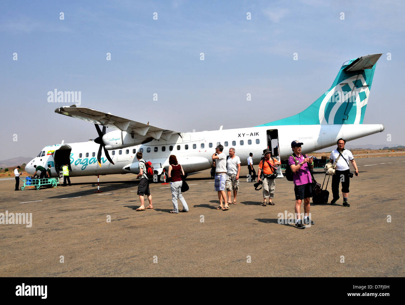 tourists leaving Air Bagan ATR airplane Myanmar Stock Photo - Alamy