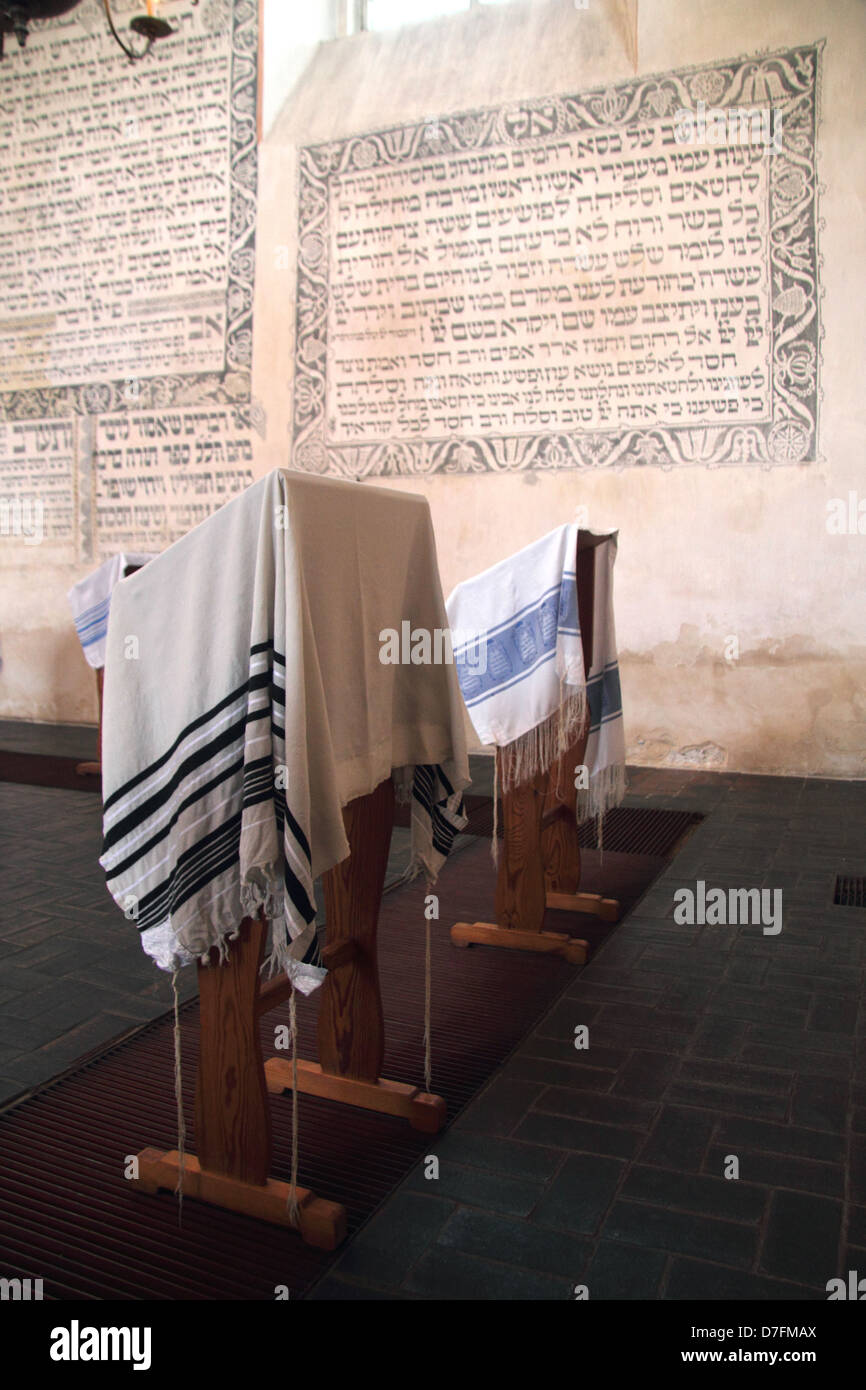 Prayer Shawls (Tallit) And Jewish Prayers Written In Hebrew On The Wall ...