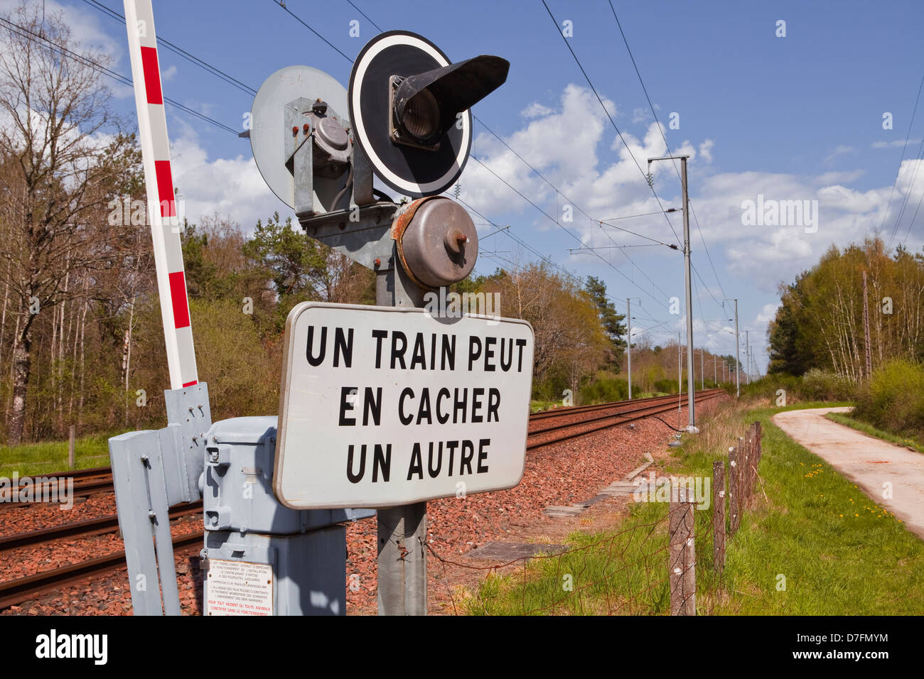 A road sign in France warning that one train can be followed by another ...