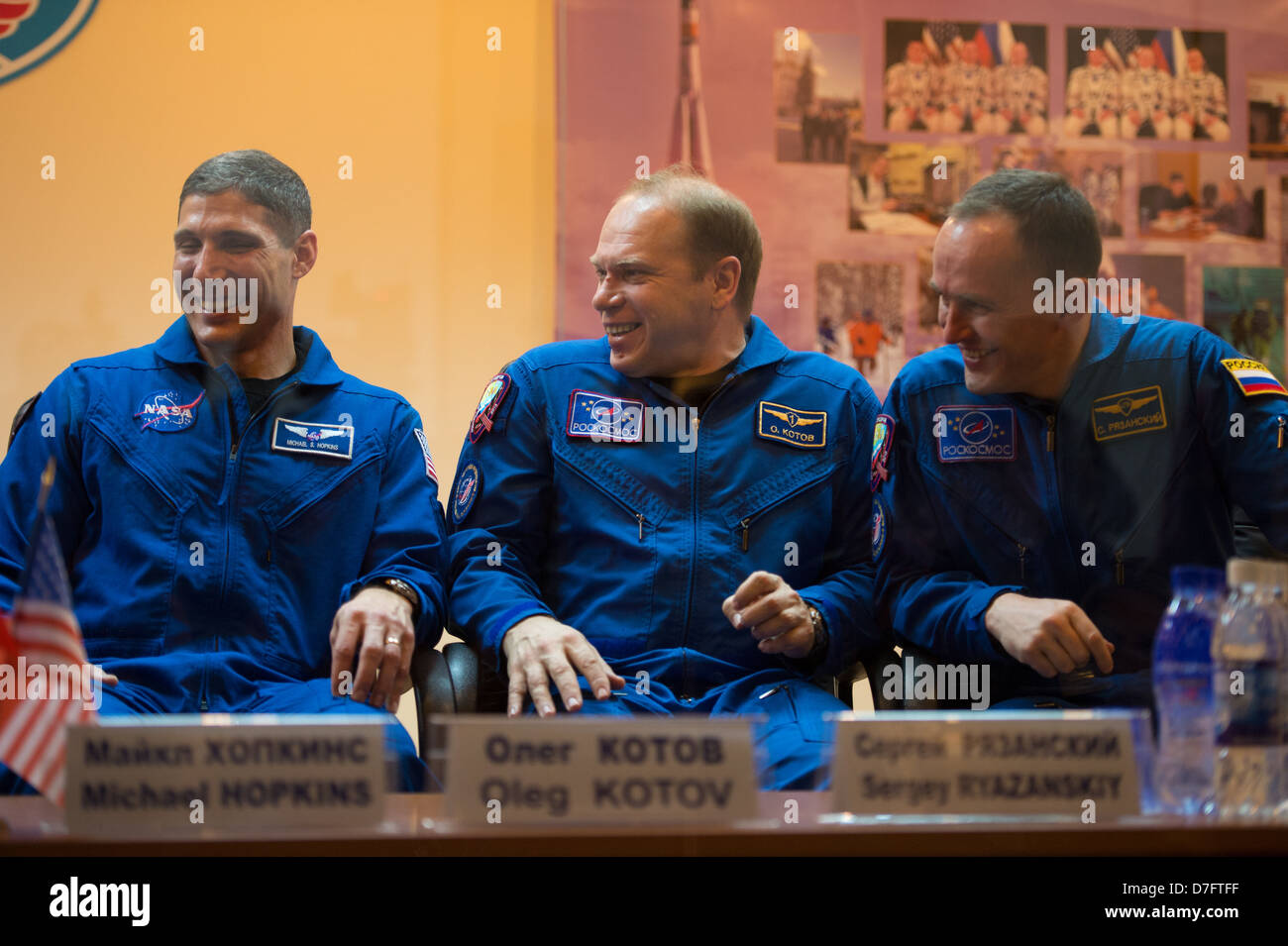 The Expedition 35 crew, including Michael Hopkins, Oleg Kotov, and ...