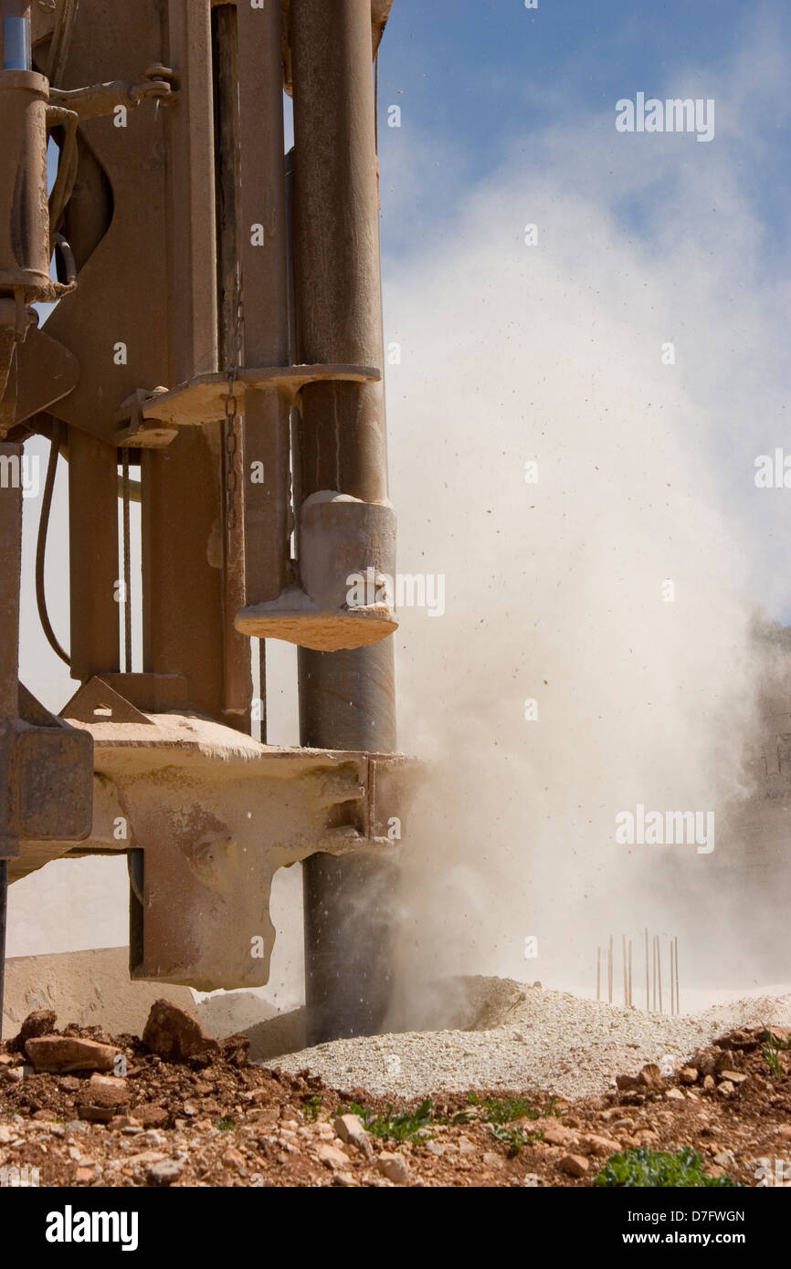 drilling to create pre tensioned concrete (Pile) for a new house Stock ...