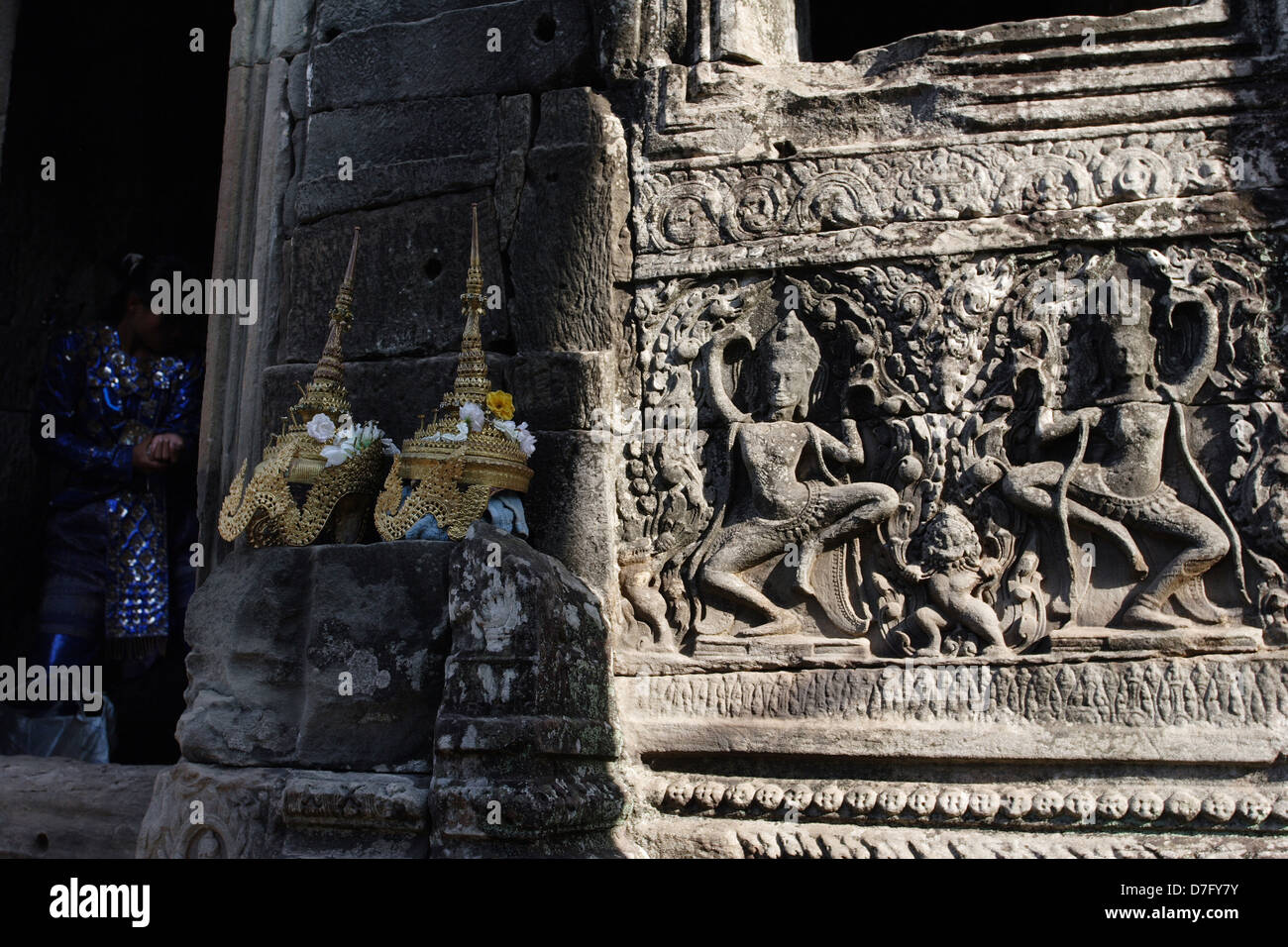 Dancer in traditional royal ballet dress prepares to pose for tourists ...
