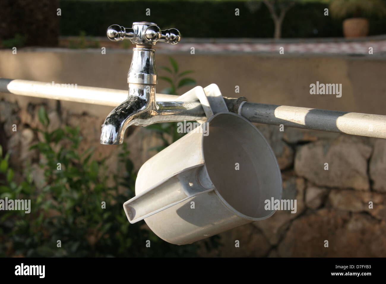 jug used to wash hands upon leaving the cemetery Stock Photo - Alamy