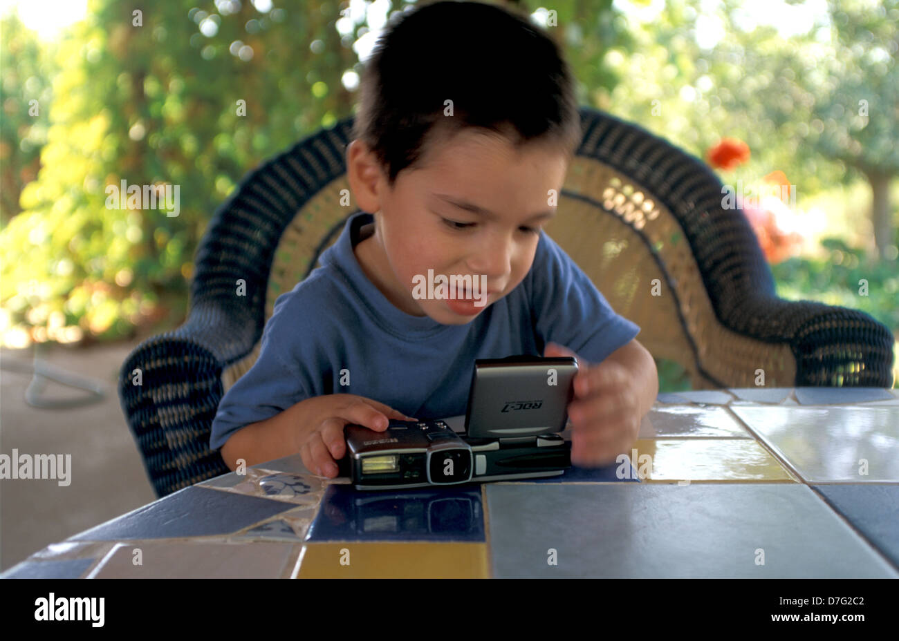 child using a digital camera Stock Photo - Alamy