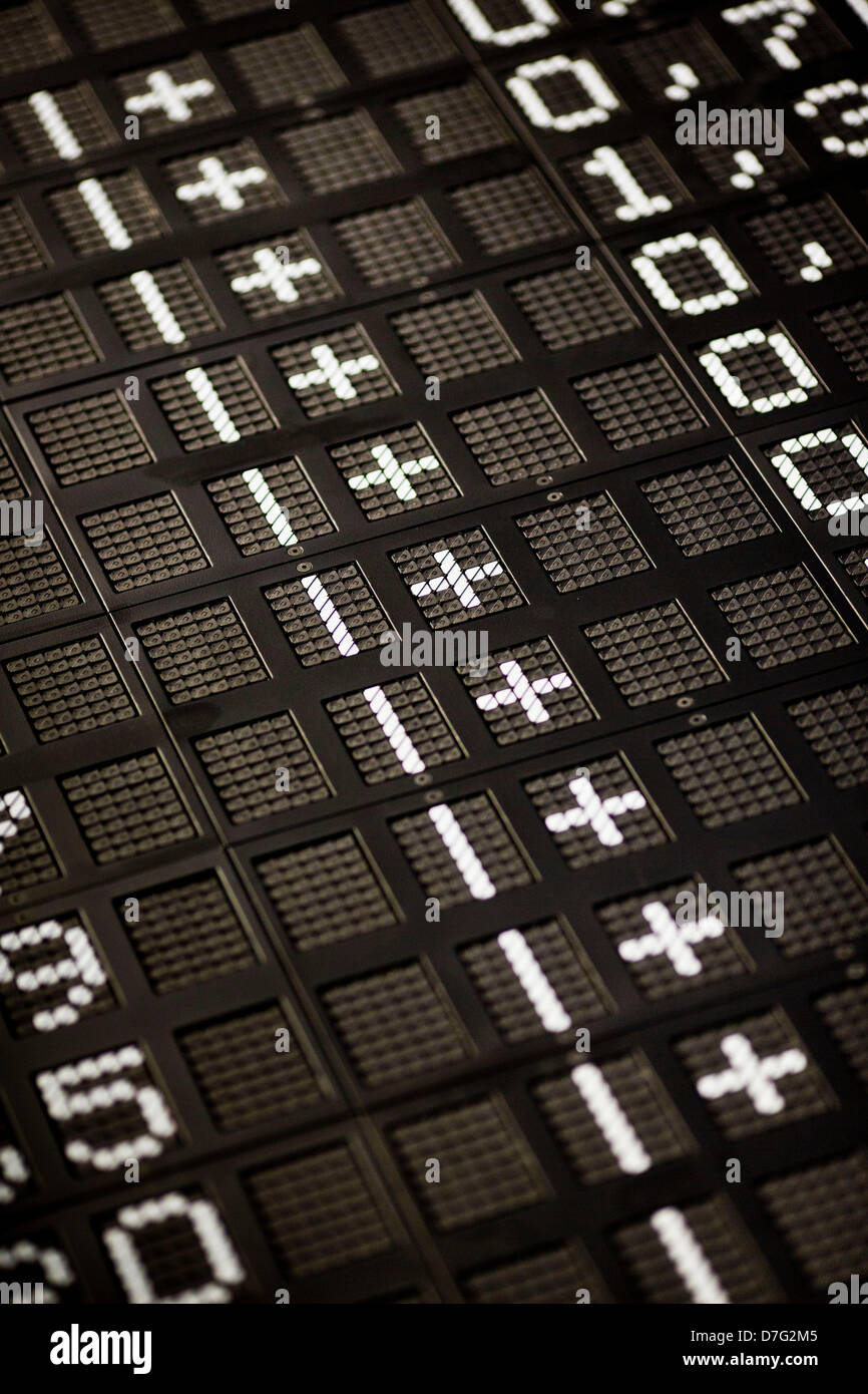 A plus sign is displayed in front of shares on a board at the Stock ...