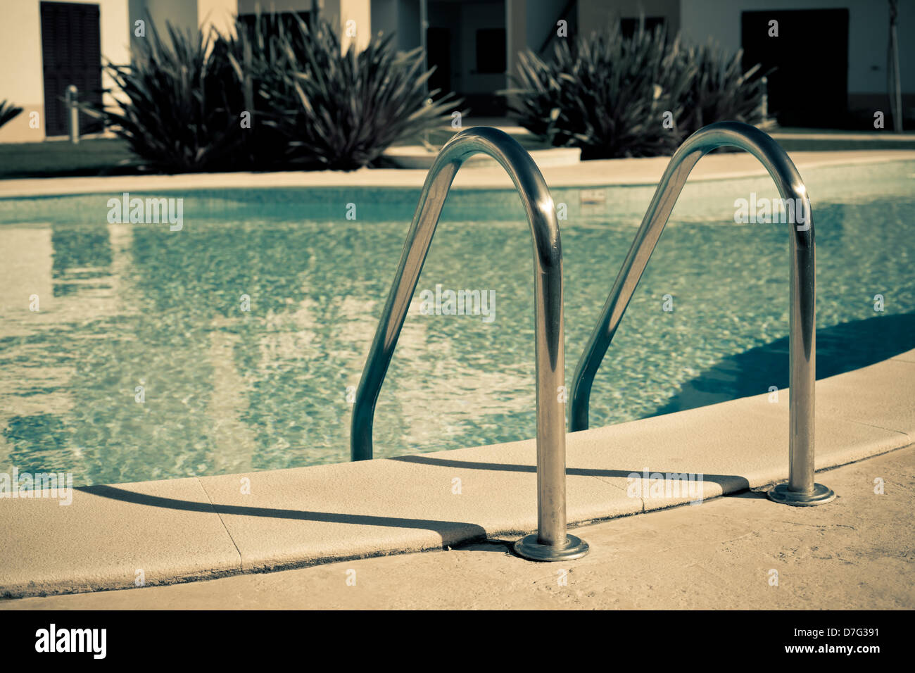 Ladder of a swimming pool. Horizontal shot Stock Photo - Alamy