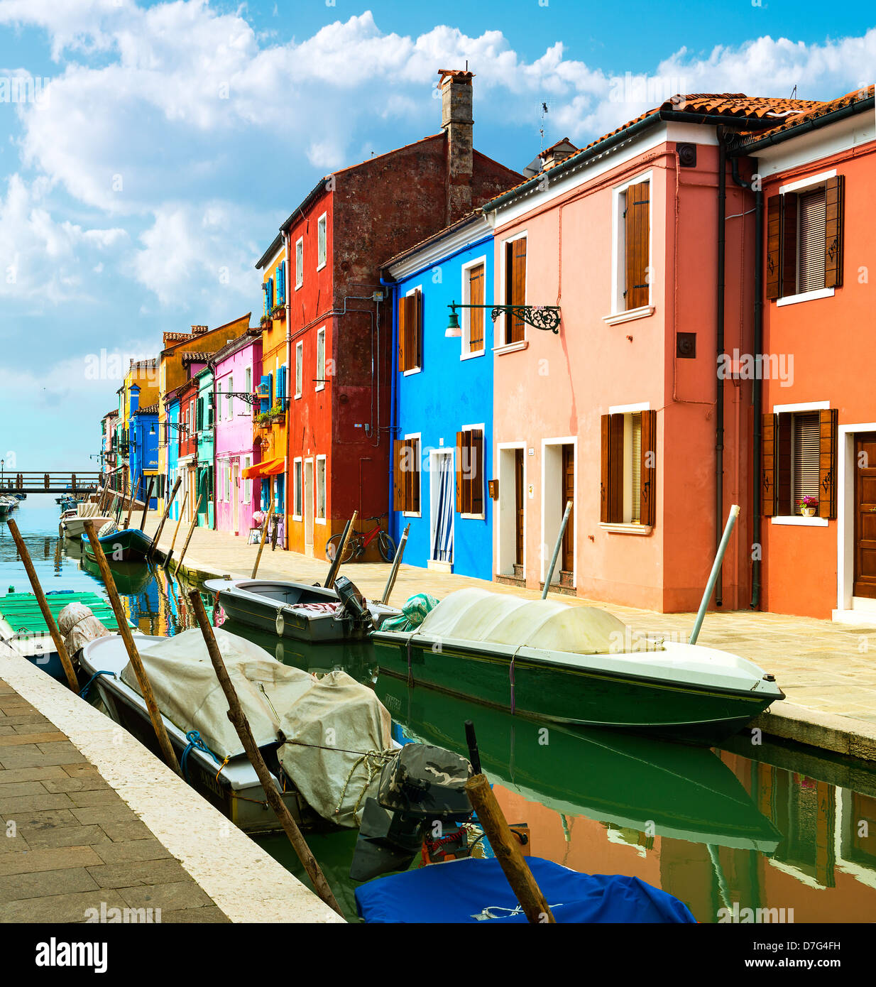 Colorful buildings in Burano island sunny street, Venise, Italy Stock ...