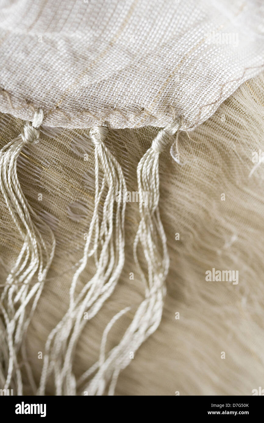 lovely woven fabric with long threads background Stock Photo - Alamy