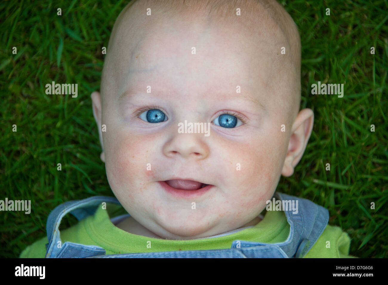 A close up of a blond haired blue eyed caucasion boy, England with the ...