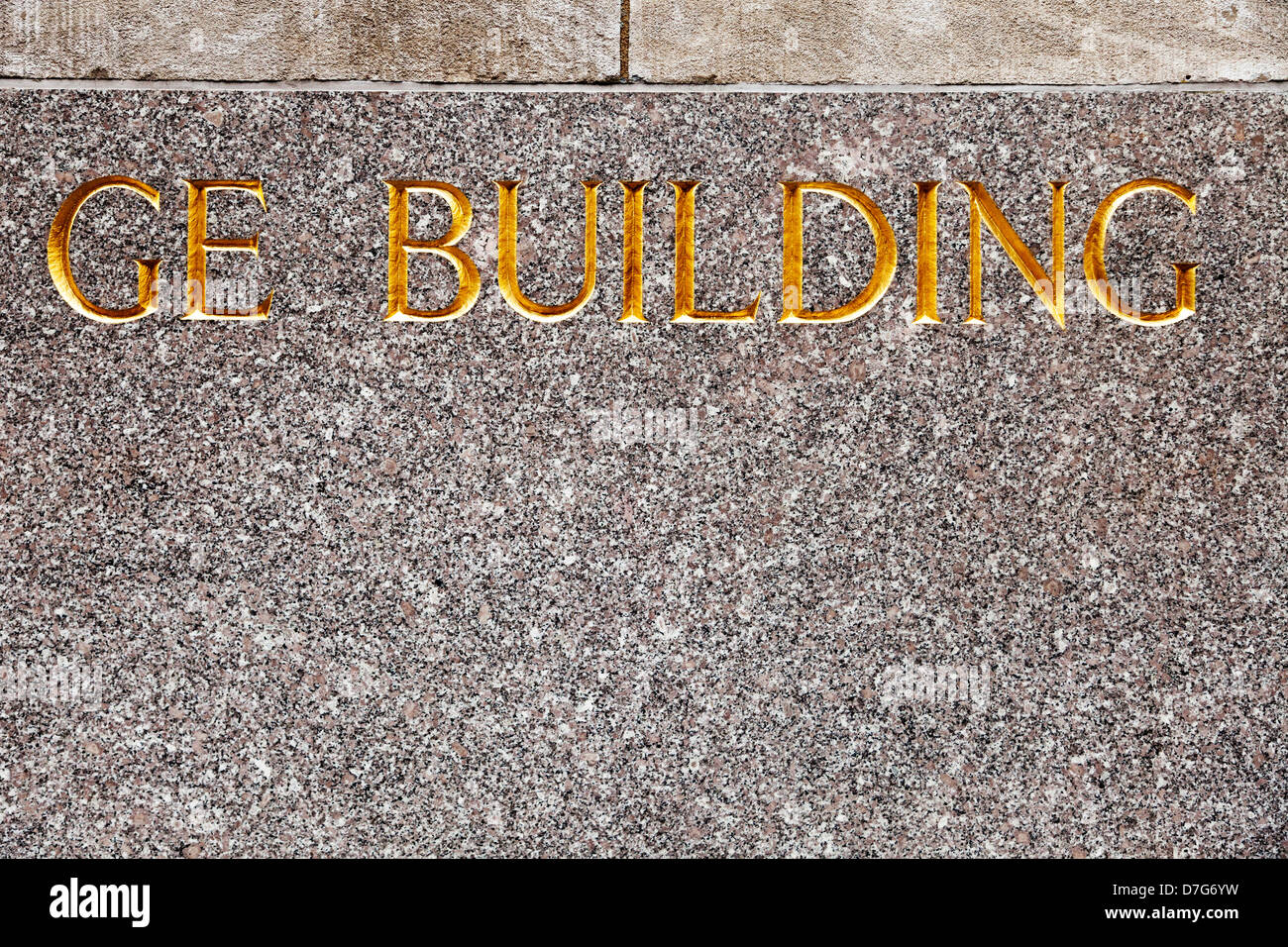 New-York USA - November 20th 2012: GE Building engraving in gold on one ...