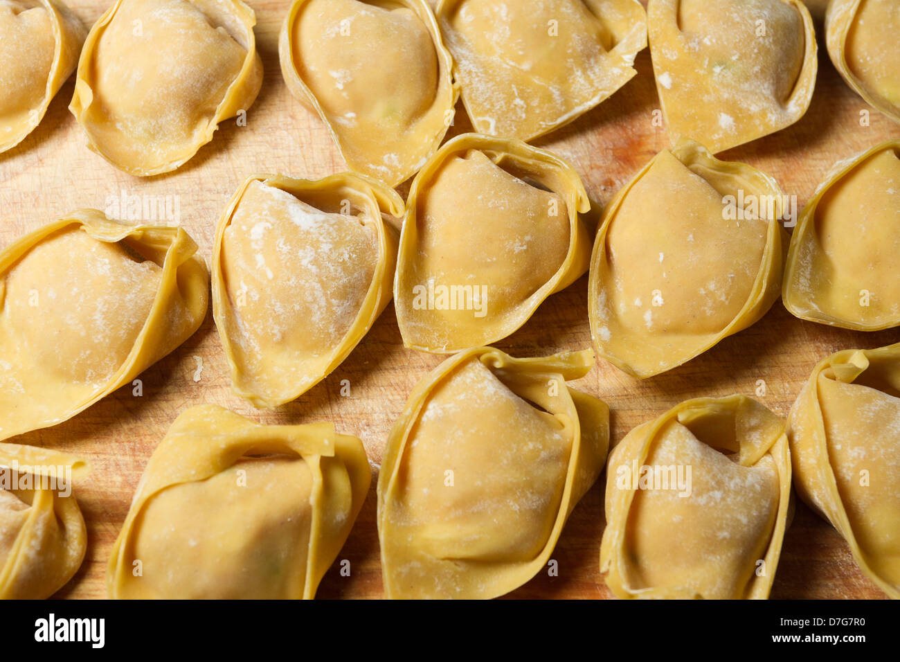 Fresh uncooked Chinese pork won ton/wonton, one of many food items ...