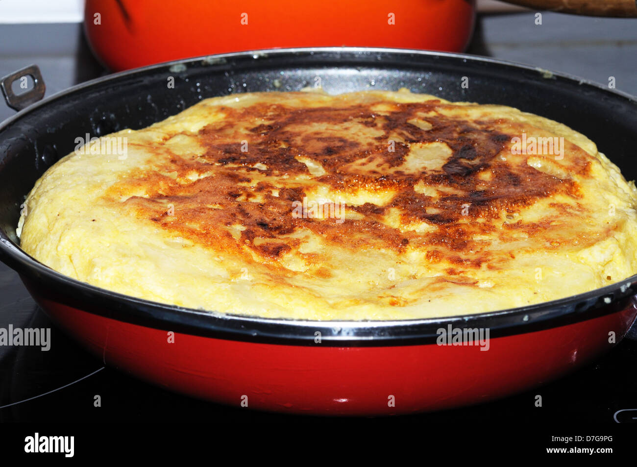 Homemade Spanish tortilla in a traditional tortilla pan, Andalusia ...