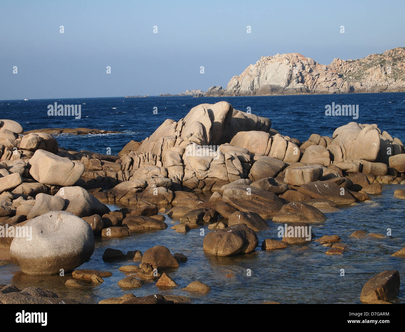 Lots of cracked rocks in the sea Stock Photo - Alamy