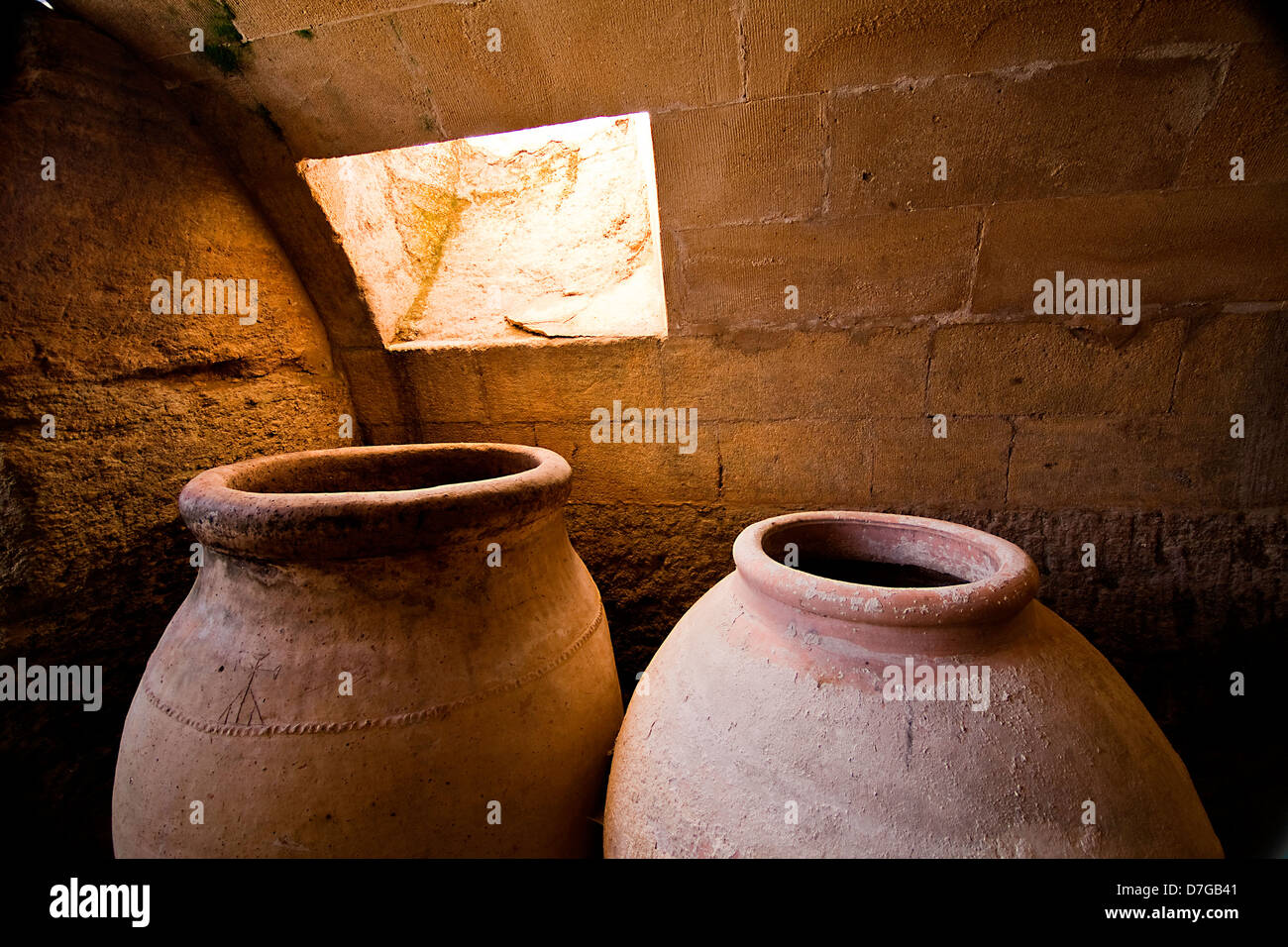 Jars of clay to preserve foods in the cellar. La Mota castle, Alcala la ...