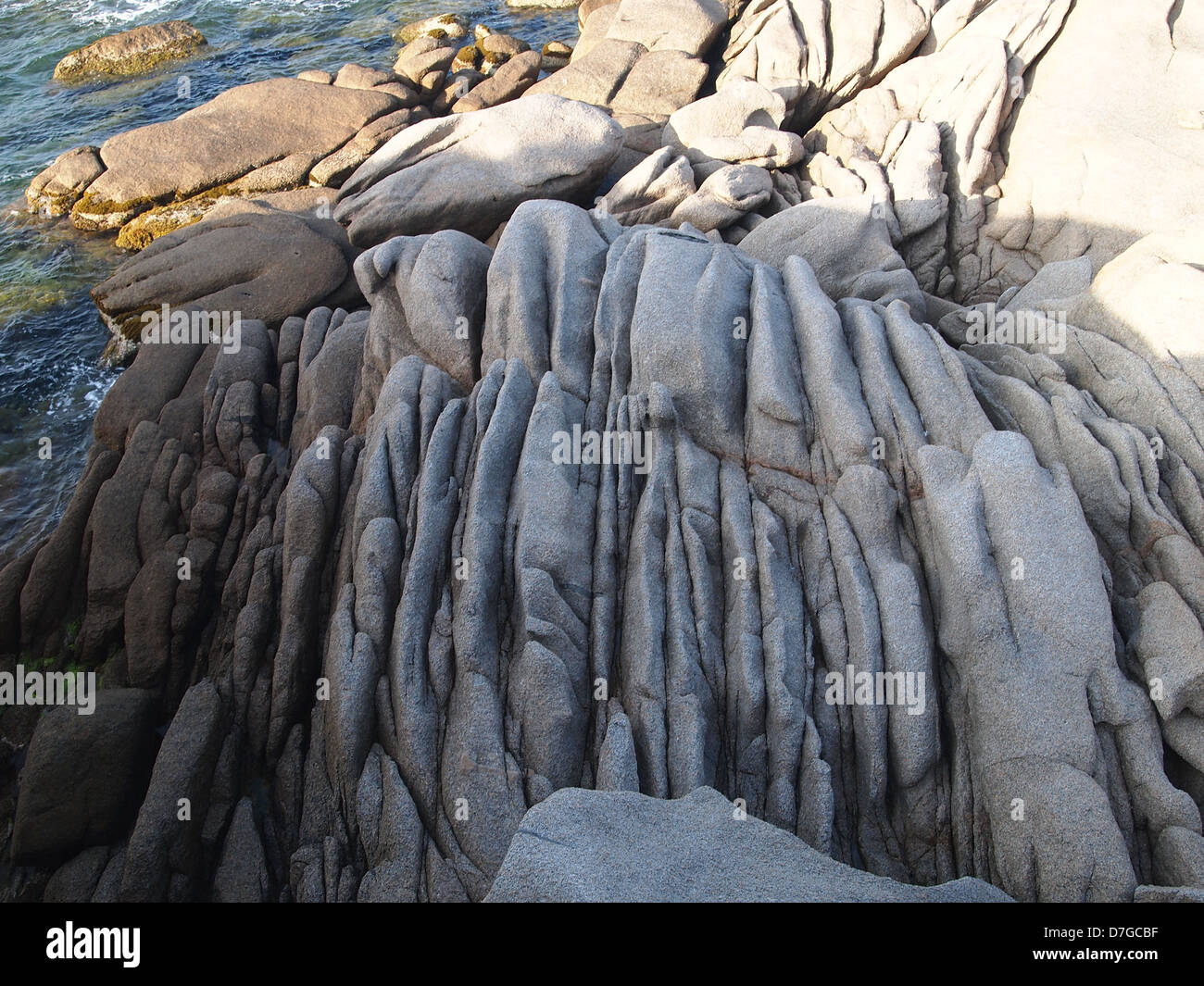 Cracked rocks on Sardinia island Stock Photo - Alamy