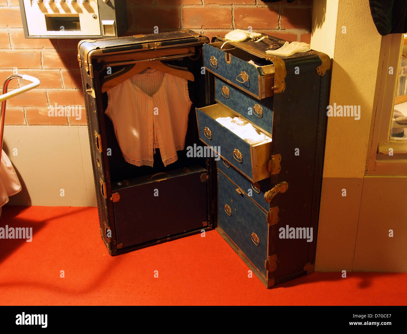 An old, large suitcase, showcasing vintage design and craftsmanship. It ...