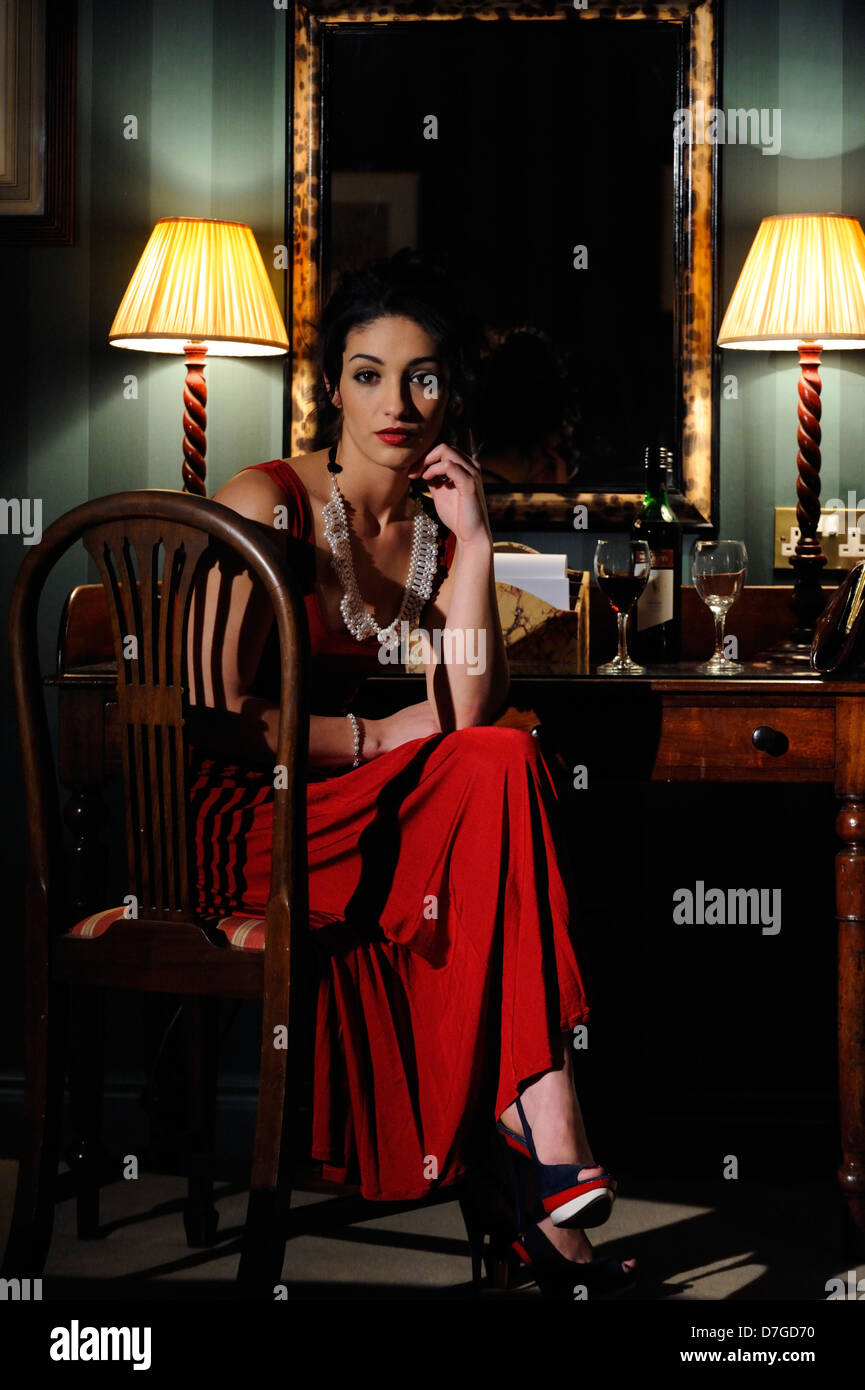 Demure woman hi-res stock photography and images - Alamy