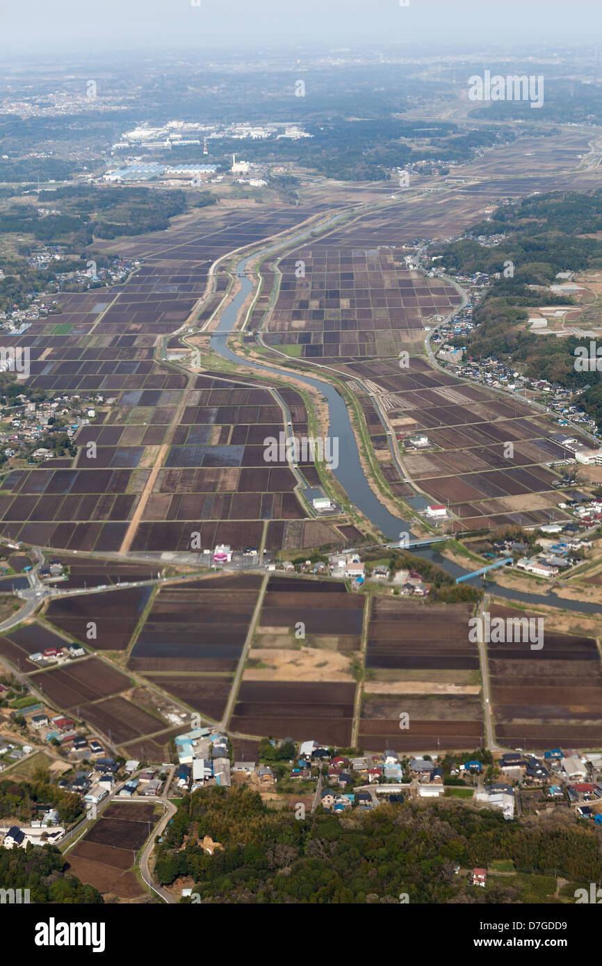 Japanese countryside with rice fields, river and small towns and ...