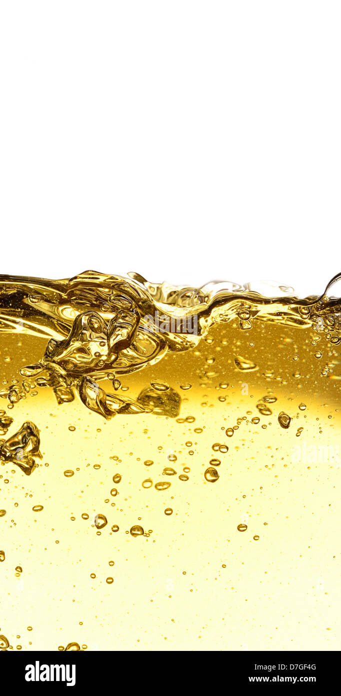 Golden oil background with bubbles Stock Photo - Alamy