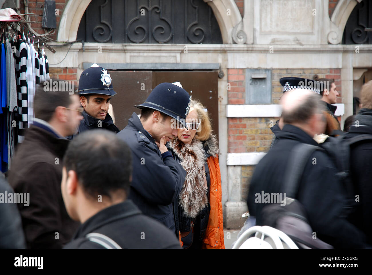 British policeman talking hi-res stock photography and images - Alamy