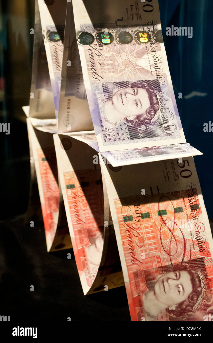 Money pyramid made of UK banknotes Stock Photo - Alamy